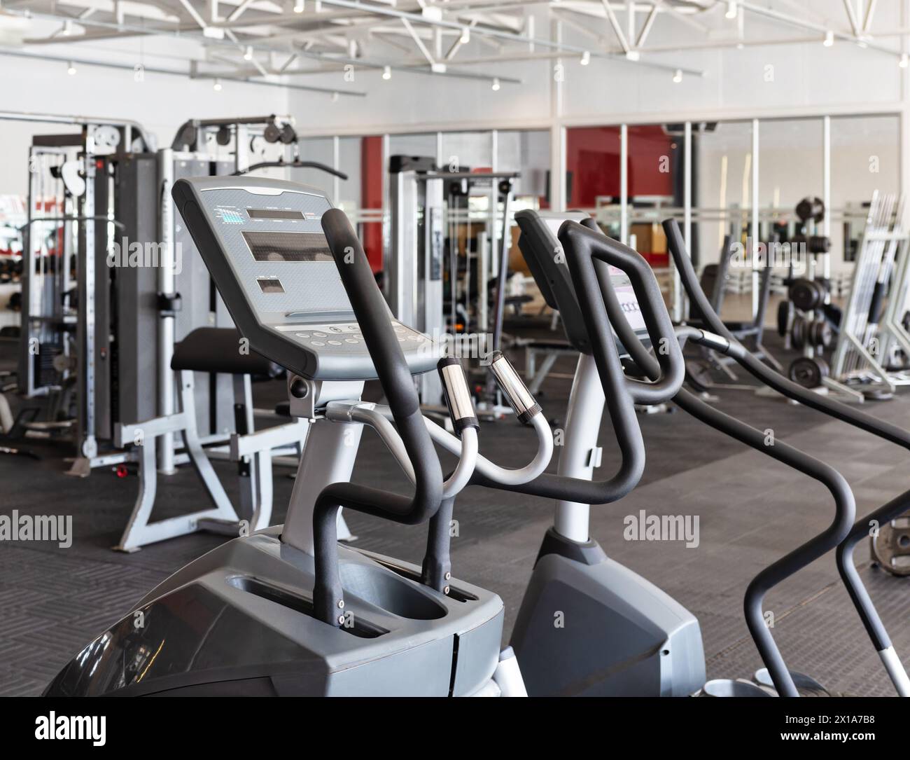 gym interior, modern machines treadmills and dumbbells Stock Photo - Alamy