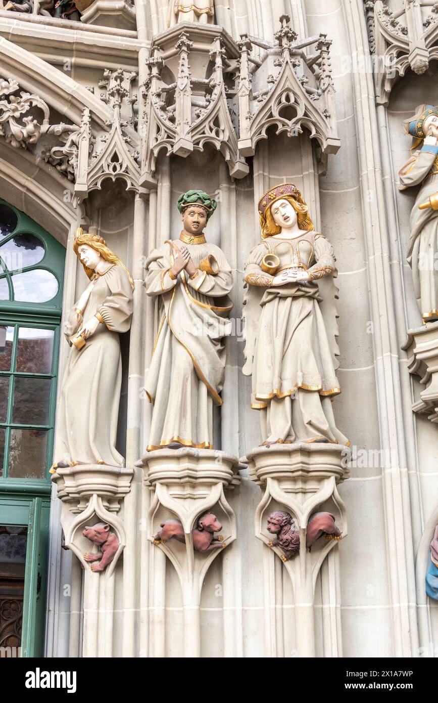 The saint statues on the front door of the cathedral of Bern ...