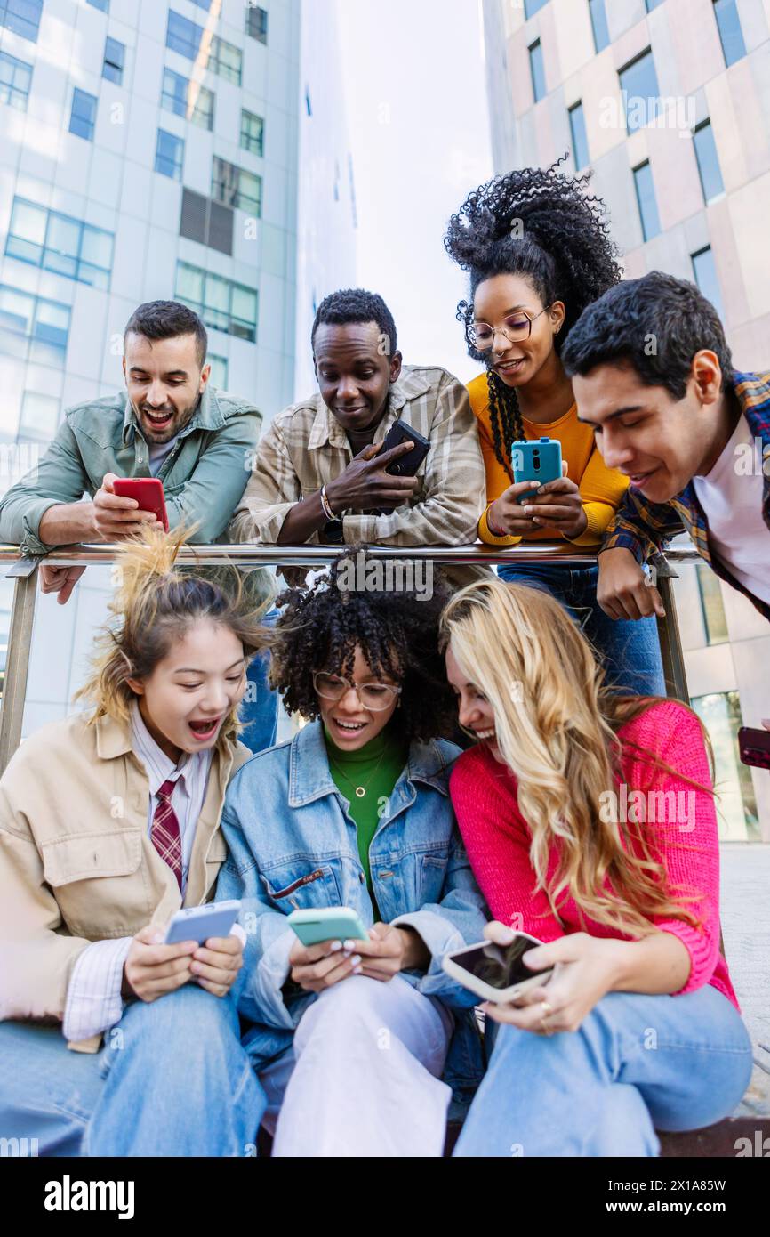 Happy diverse girl friends using hi-res stock photography and images ...