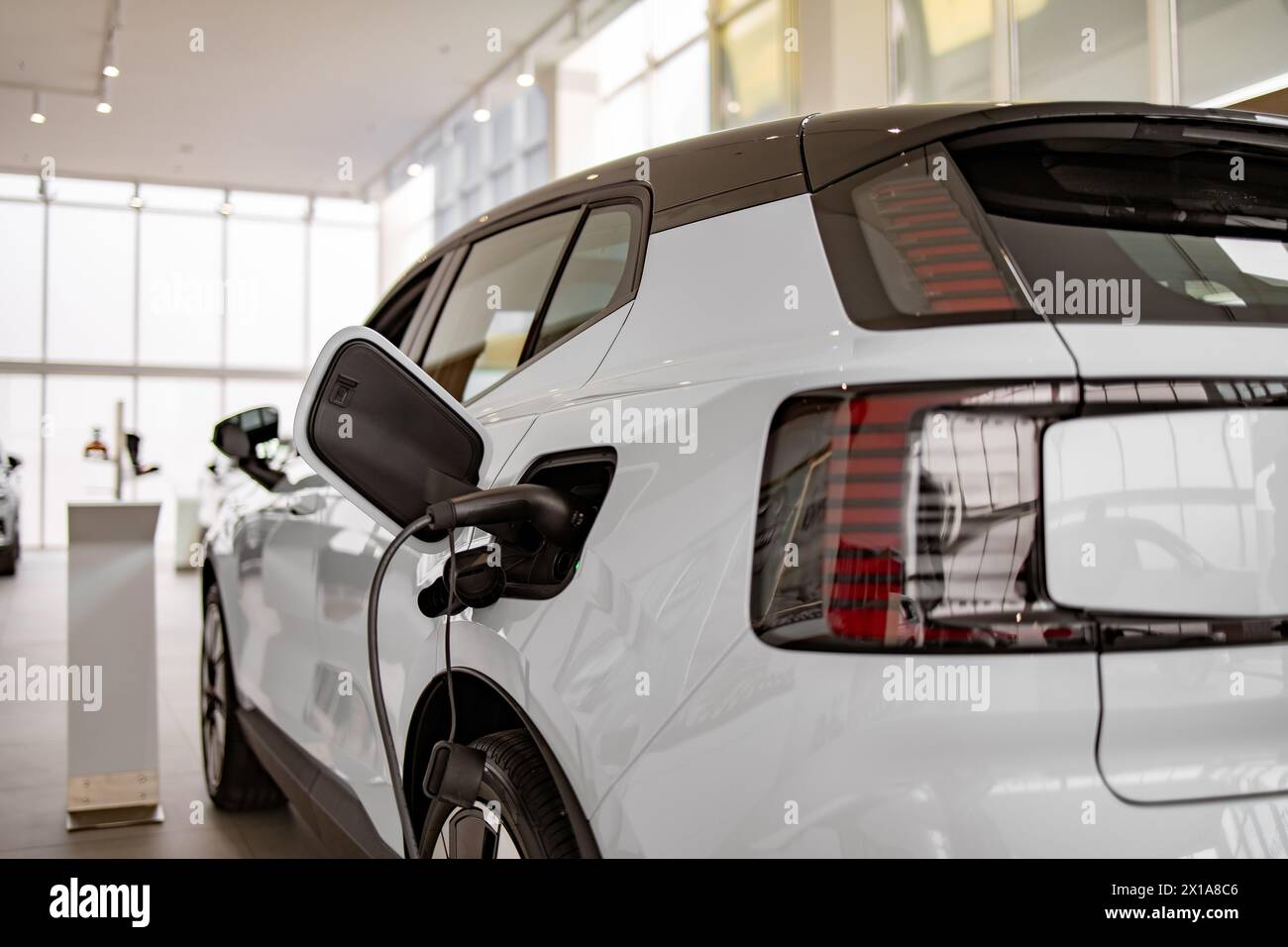 Exterior of new brand fully electric suv car in light dealership Stock ...