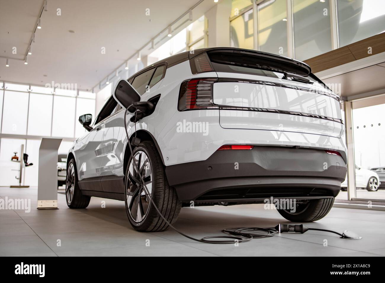 Exterior of new brand fully electric suv car in light dealership Stock ...