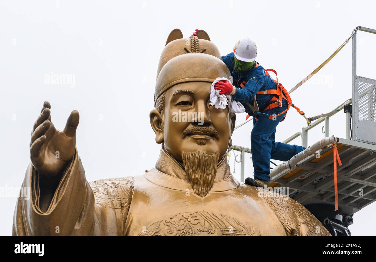 Seoul, South Korea. 16th Apr, 2024. A worker cleans the statue of ...