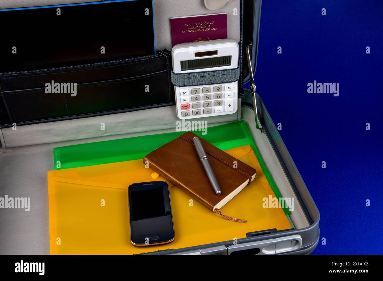 Blue briefcase yellow lock hi-res stock photography and images - Alamy