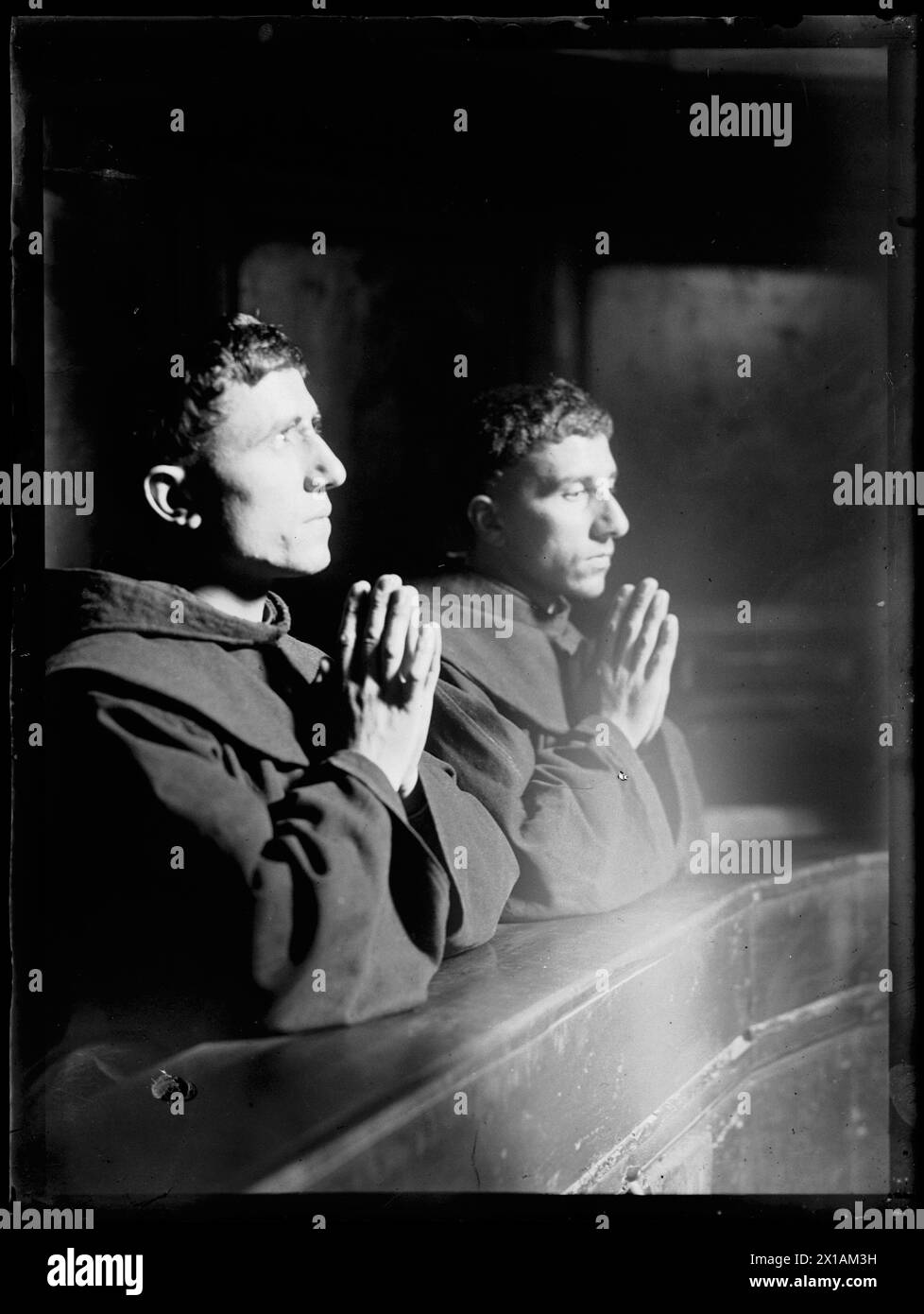 Prayer Franciscan in Assisi, prayer Franciscan in the kneeler in the ...