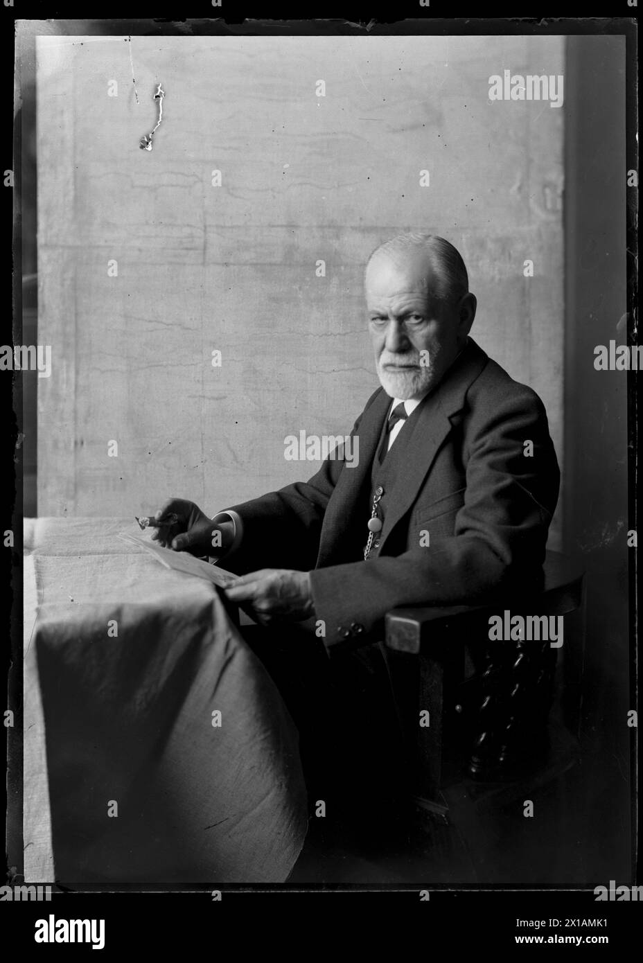 picture Sigmund Freud (1856-1939), Sigmund Freud with a newspaper at a ...