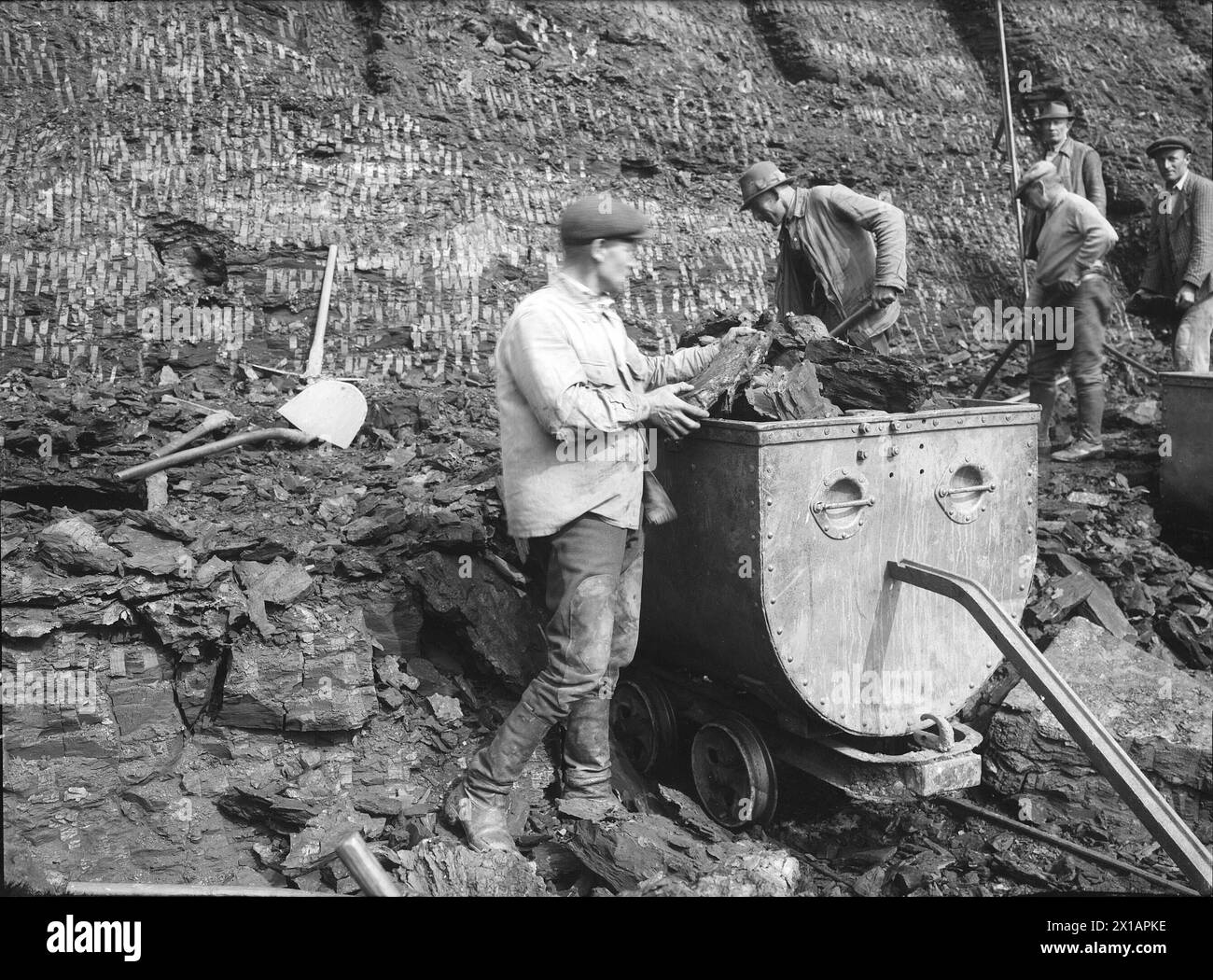 Neufeld at the Leitha, brown coal mining: worker with loading up mine ...
