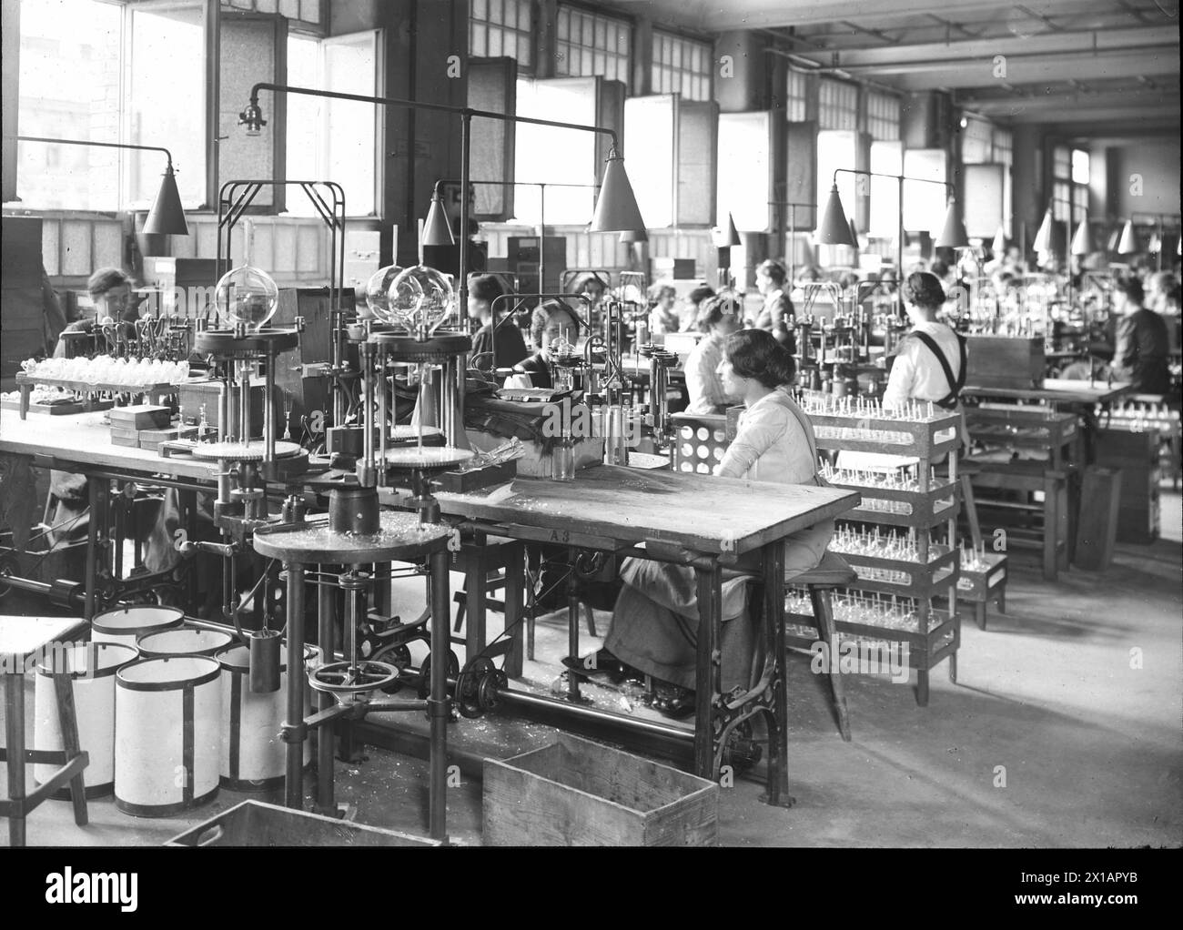 Factory building (stitching), women in front of sewing machine, 1930 ...