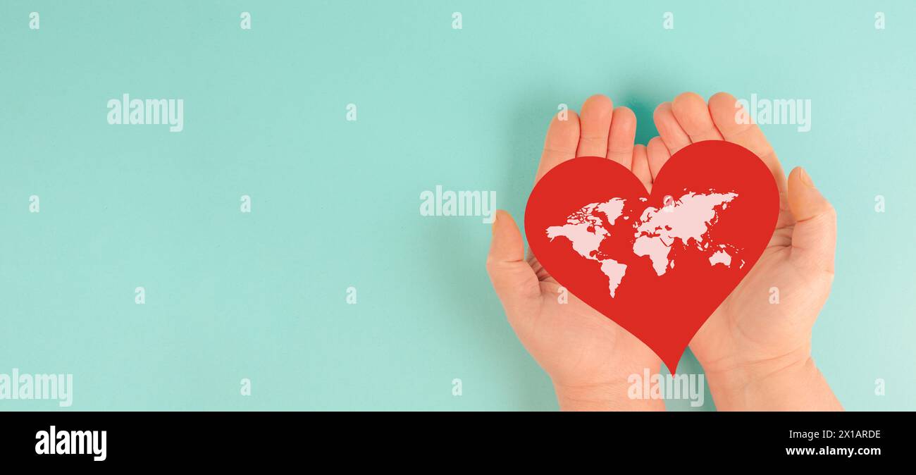 Red heart with world map, awareness of heart disease, humanitarian help ...