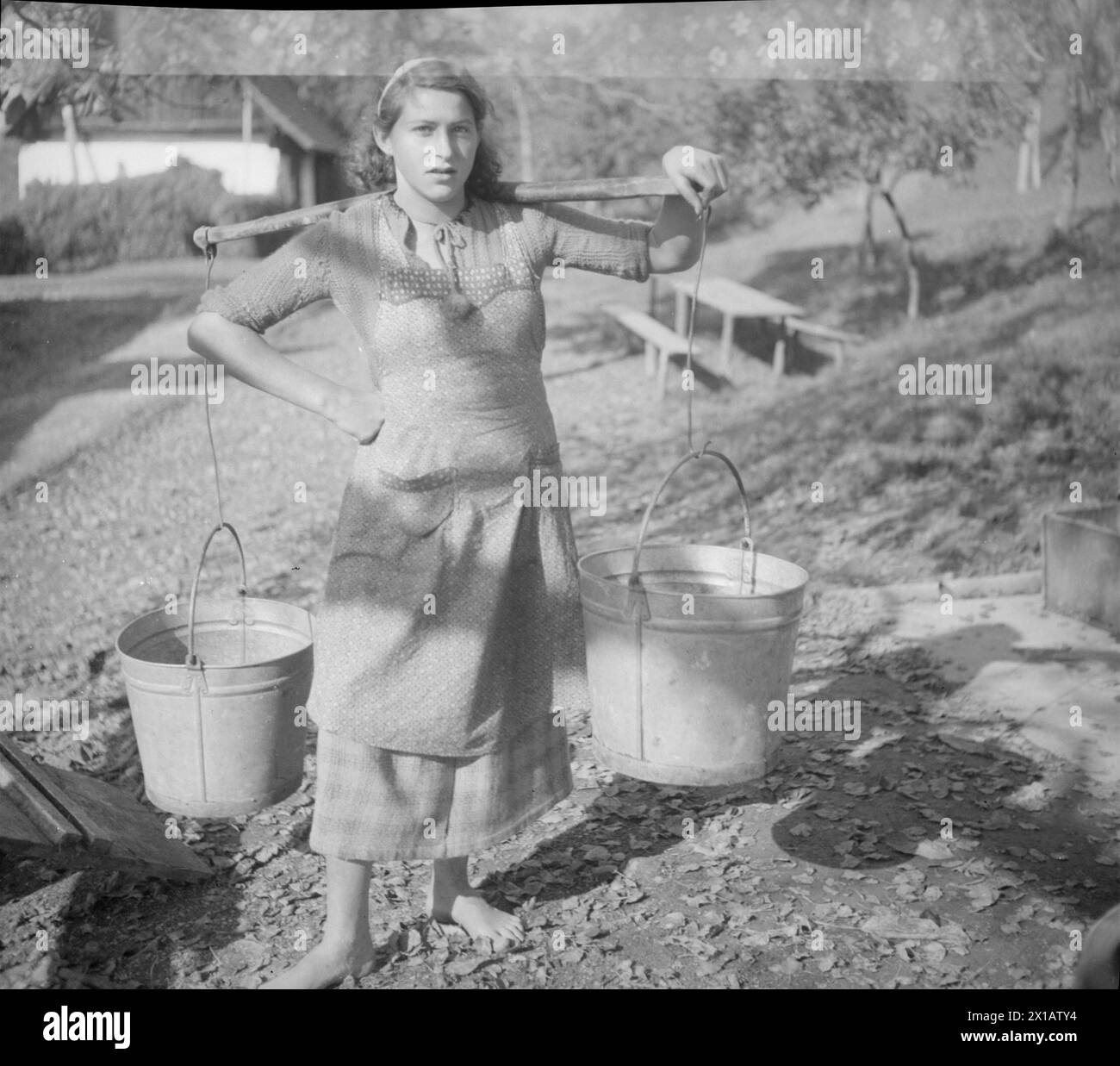 Leibnitz, peasant girl with the shoulder timber two water bucket ...