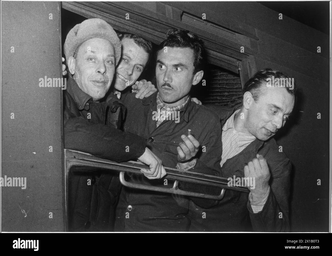 Homecomer transport from Russia, soldiers on the window of the train ...