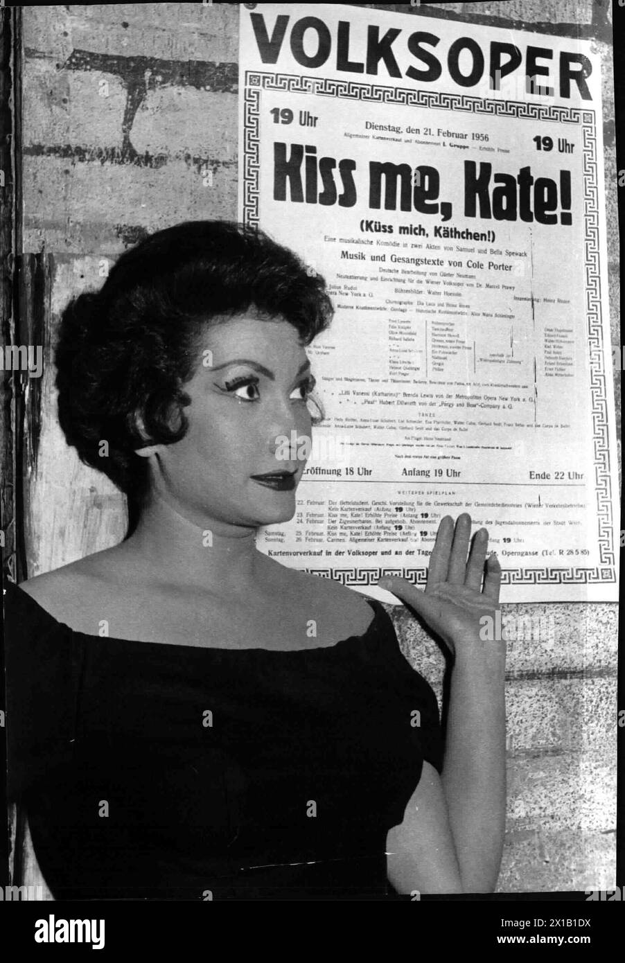 The vocalist Brenda lewis in close-up in front of a poster of the ...