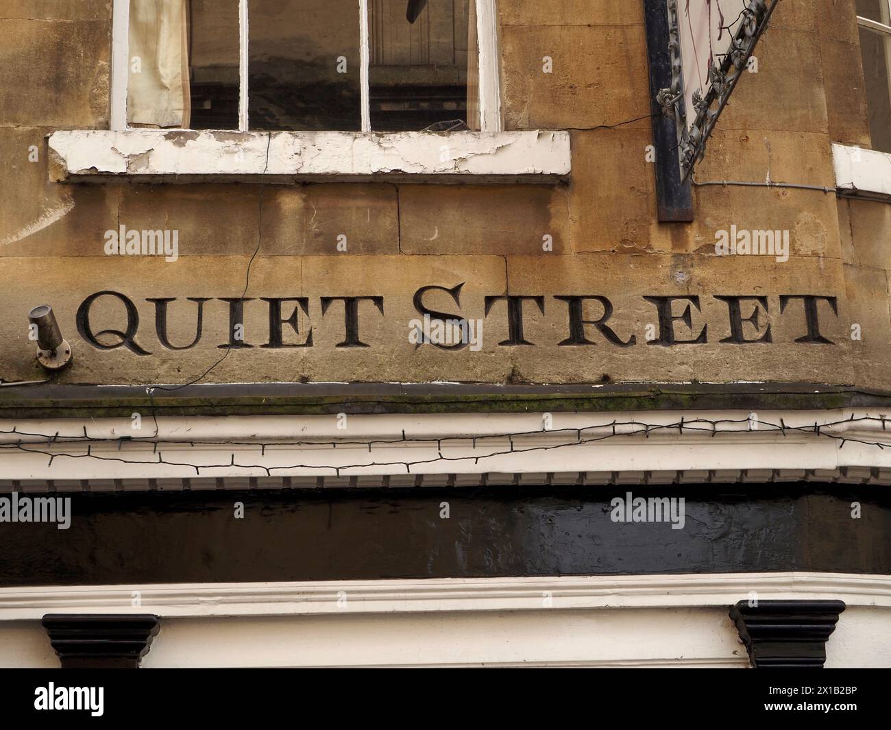 The words "Quiet Street" carved in stonework of building in Bath ...