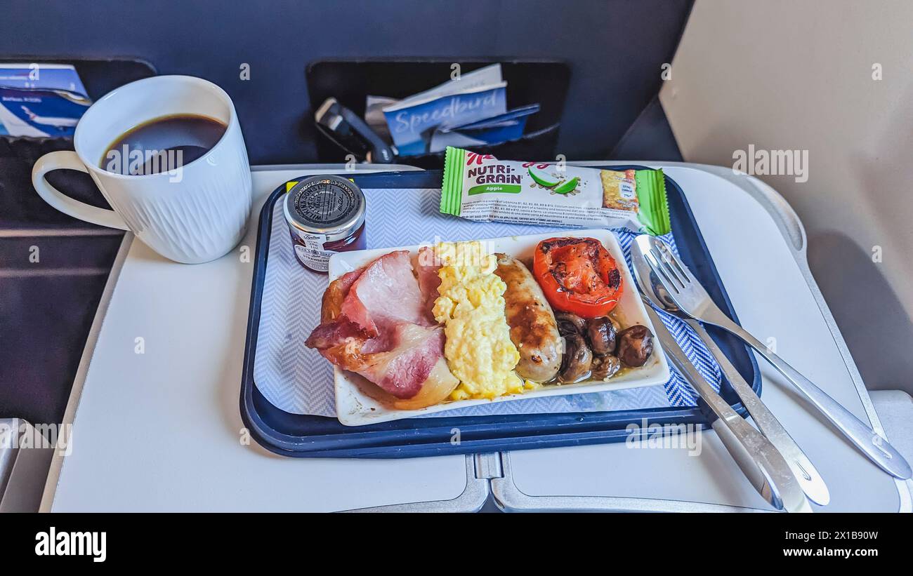 Traditional English breakfast served with coffee on board a British ...