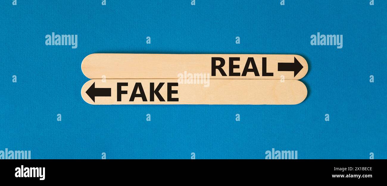 Real or fake symbol. Concept word Real or Fake on beautiful wooden ...