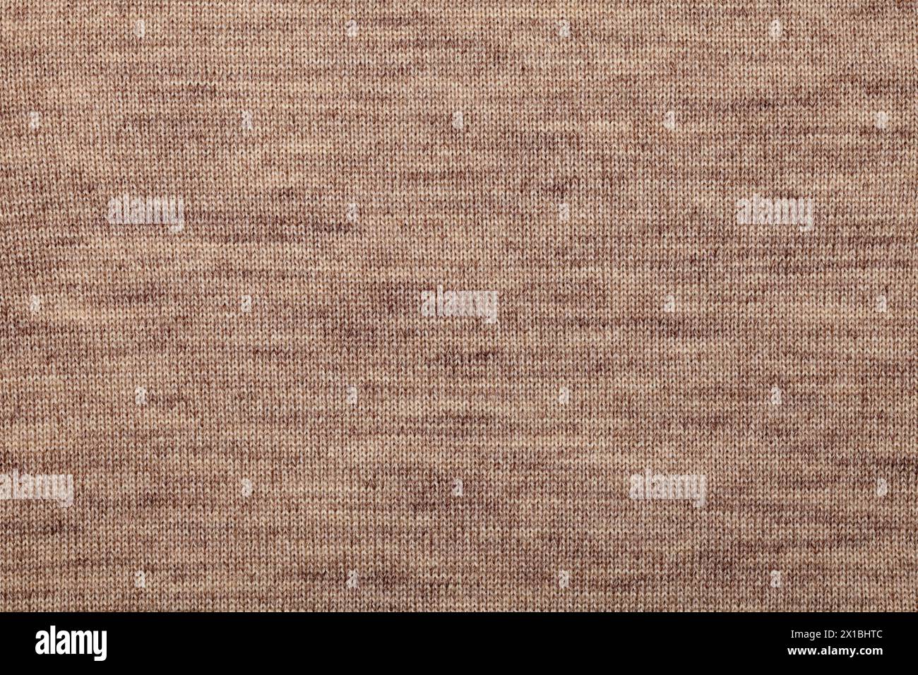 Detailed texture of beige knitted fabric made of heathered yarn Stock ...