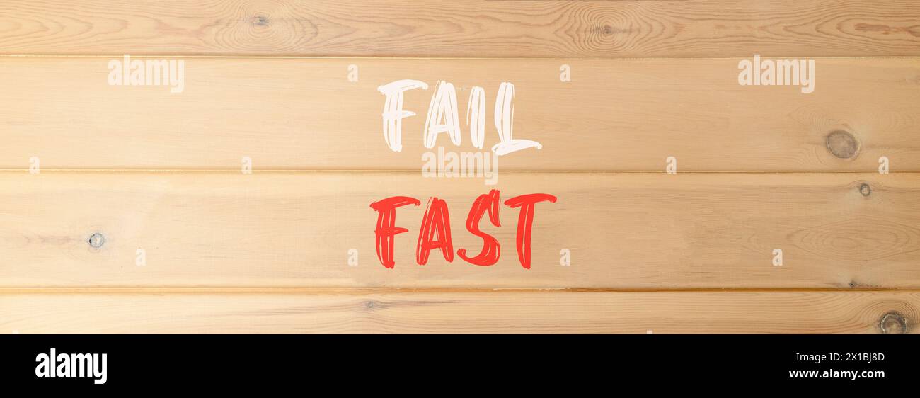 Fail fast symbol. Concept words Fail fast on beautiful wooden wall ...