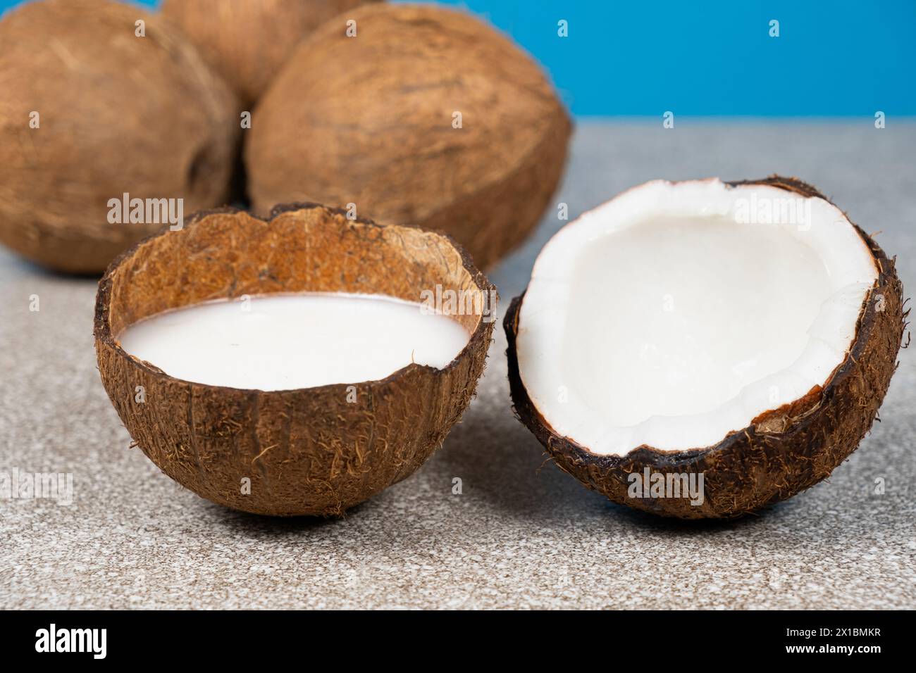 Ripe coconut on blue hi-res stock photography and images - Alamy