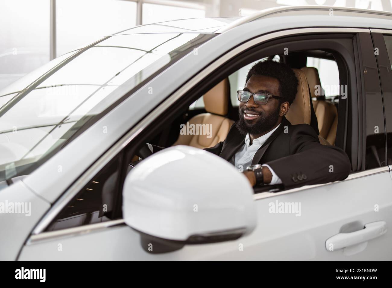 Calm African man customer buyer client in suit holding hands on ...