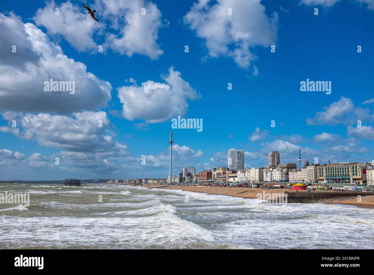 View of Brighton beach and seafront with the West Pier and i360 tourist ...