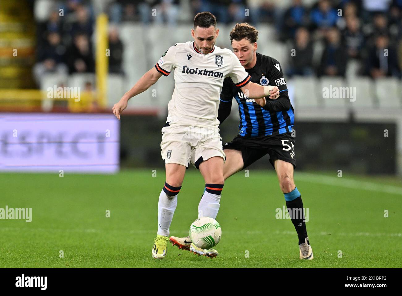 Andrija Zivkovic (14) of PAOK and Maxim De Cuyper (55) of Club Brugge ...