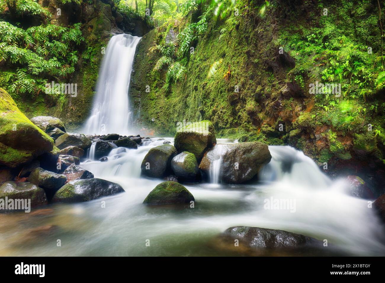 Beautiful waterfalls from the Azores - Salto do Prego, green stream in ...