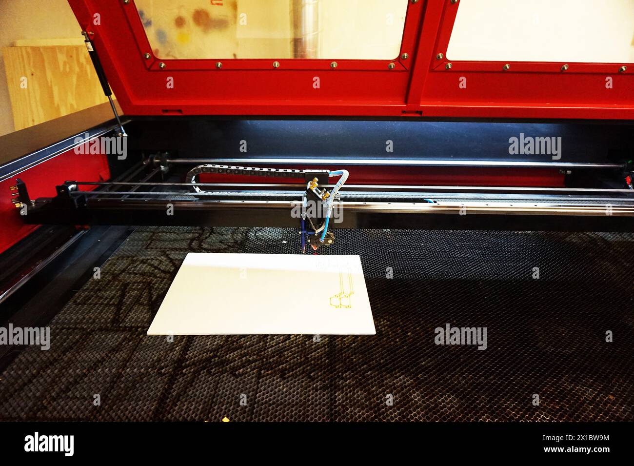 laser light is cutting piece of wood Stock Photo - Alamy