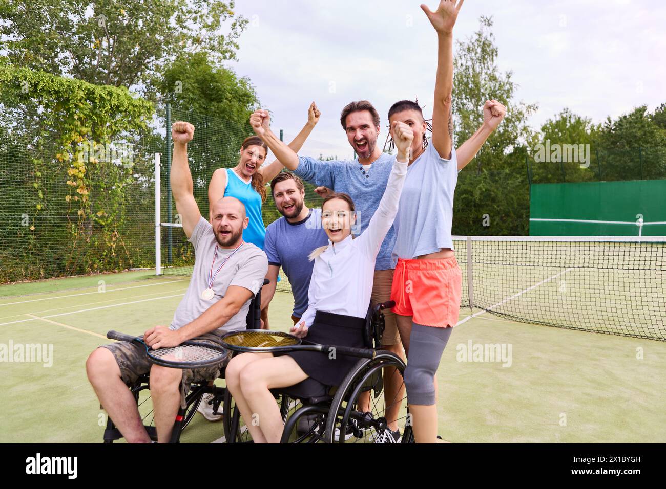 A diverse group of tennis players, including people who use wheelchairs ...