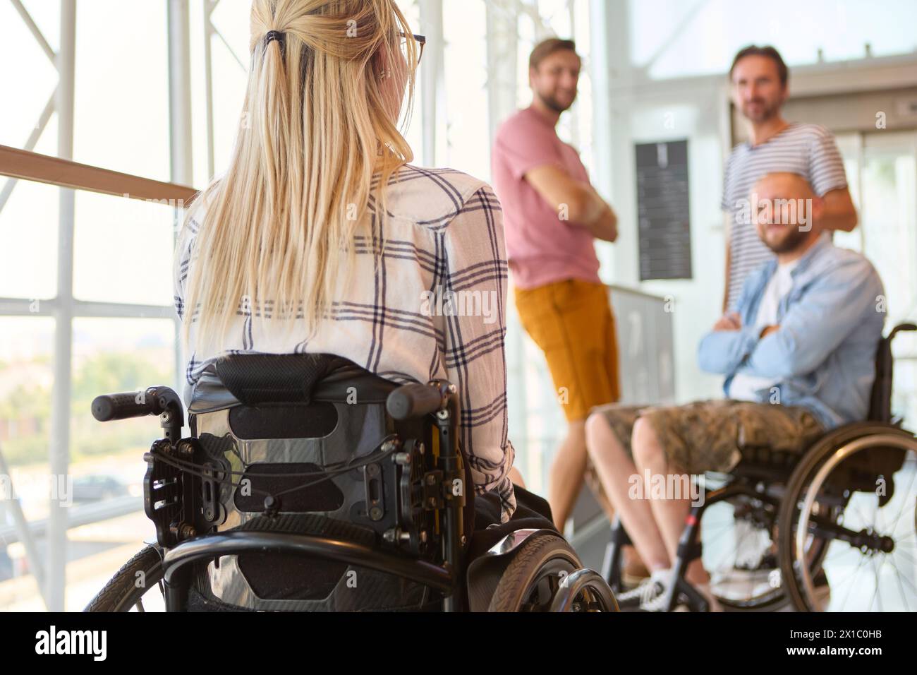 A heartwarming scene in a modern indoor setting showing a woman and two ...