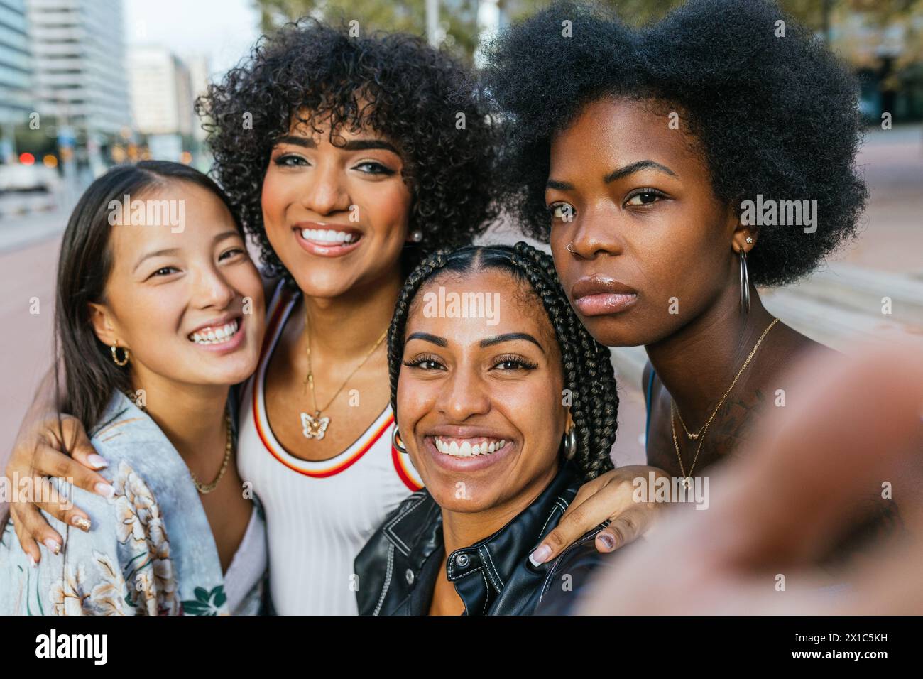 Diverse Group of female friends sharing a joyful moment together ...