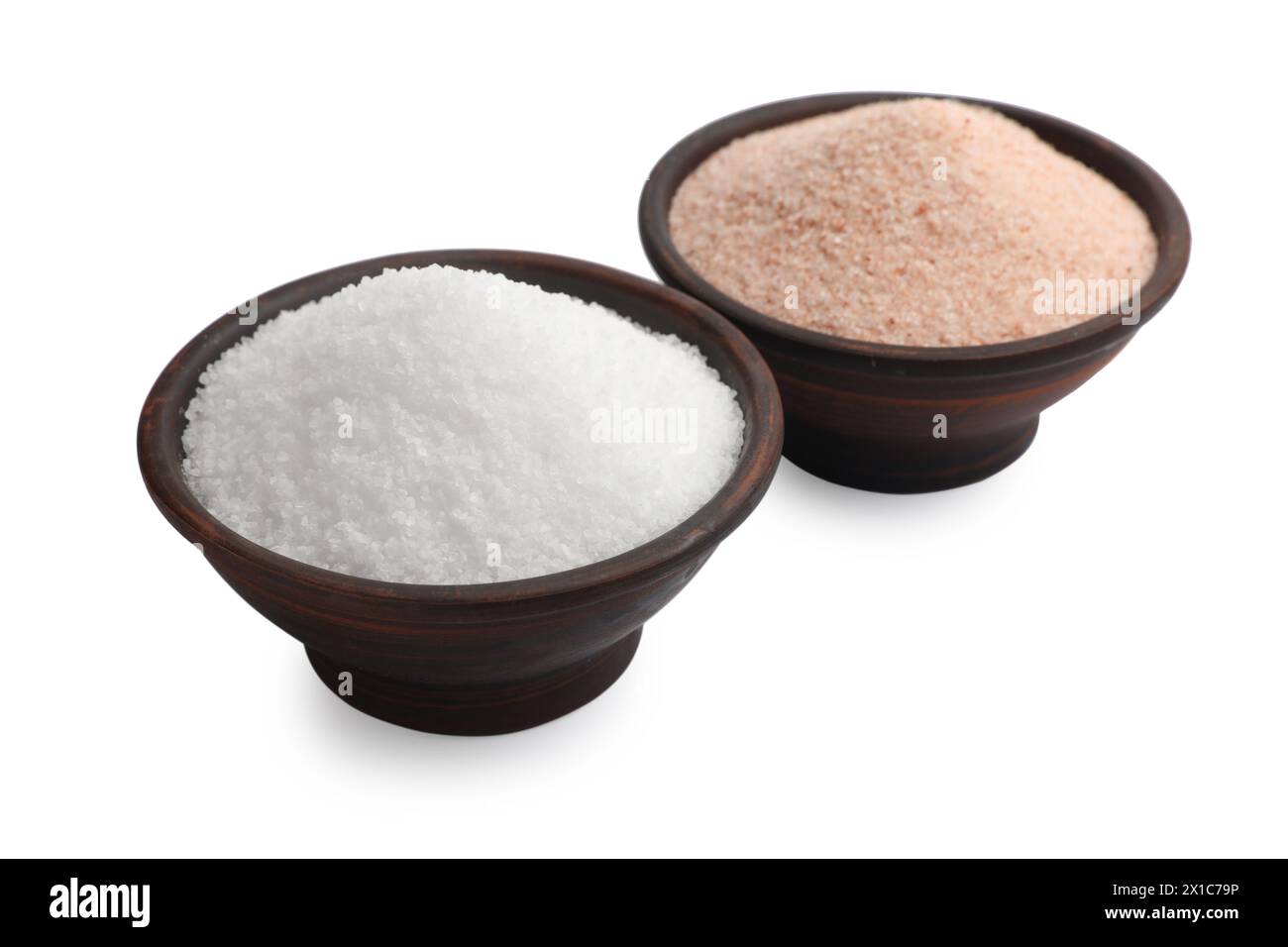Different types of natural salt in bowls isolated on white Stock Photo ...