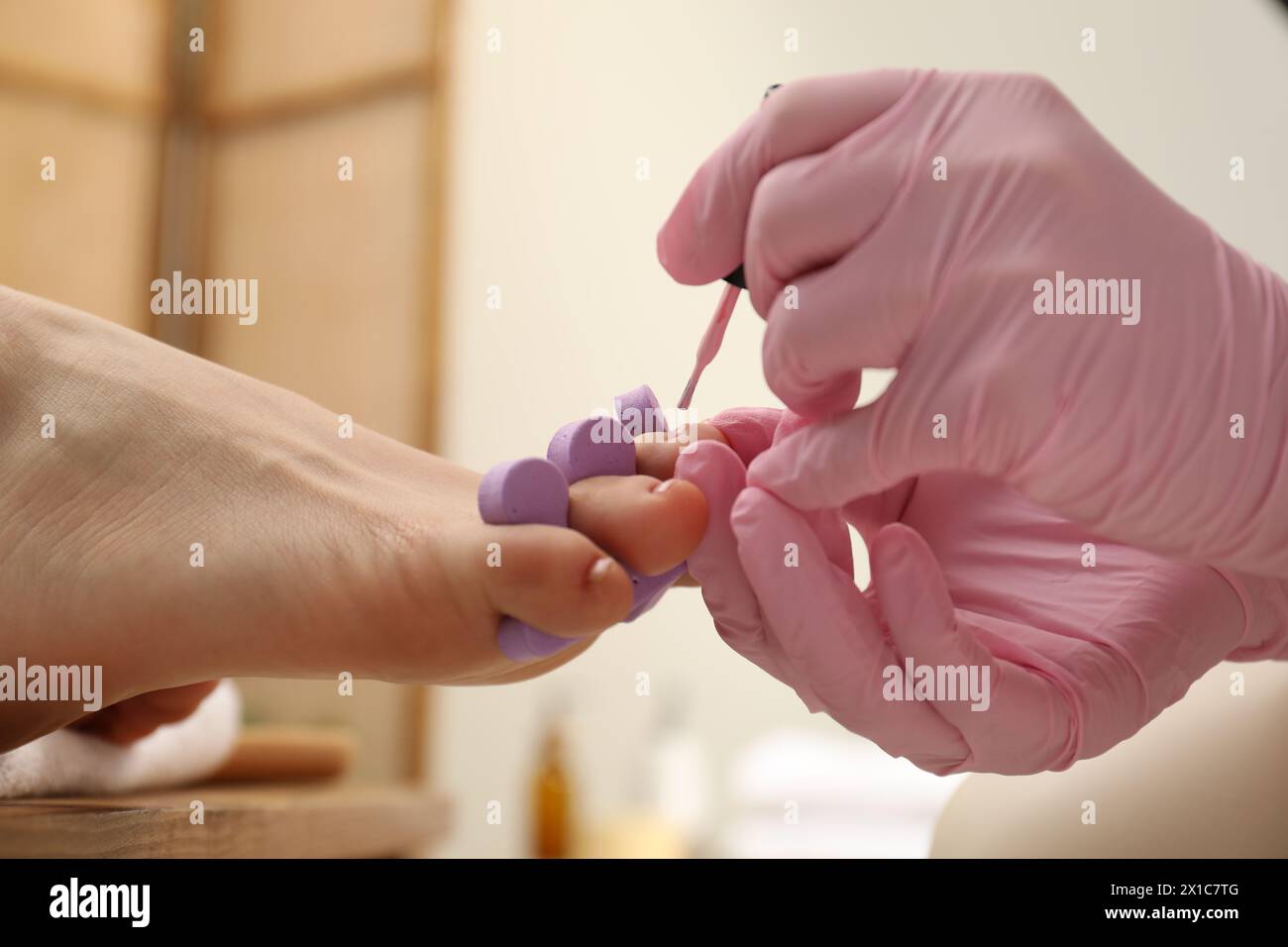 Women painting toenails hi-res stock photography and images - Alamy