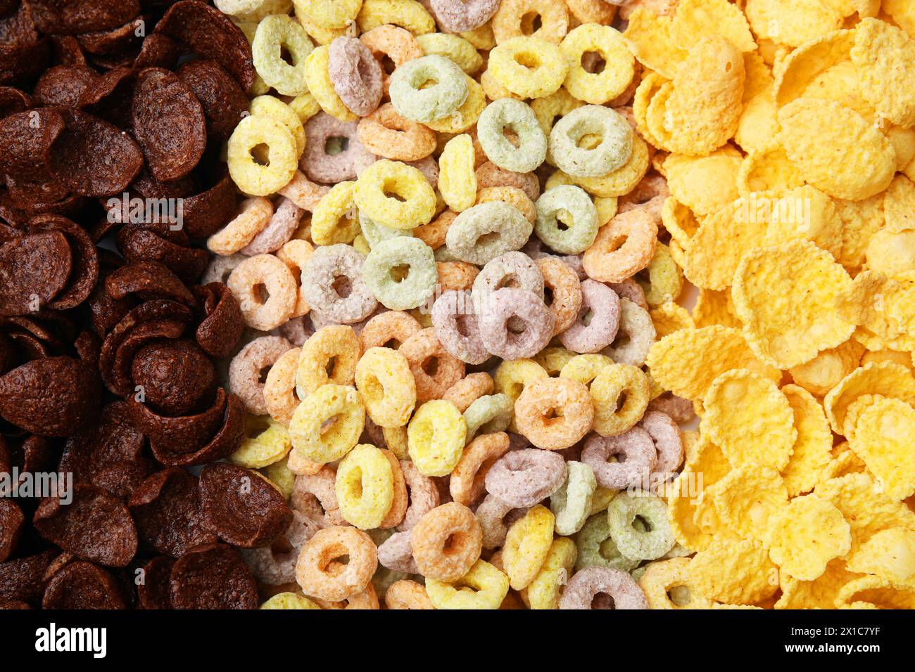 Different types of breakfast cereals as background, top view Stock ...