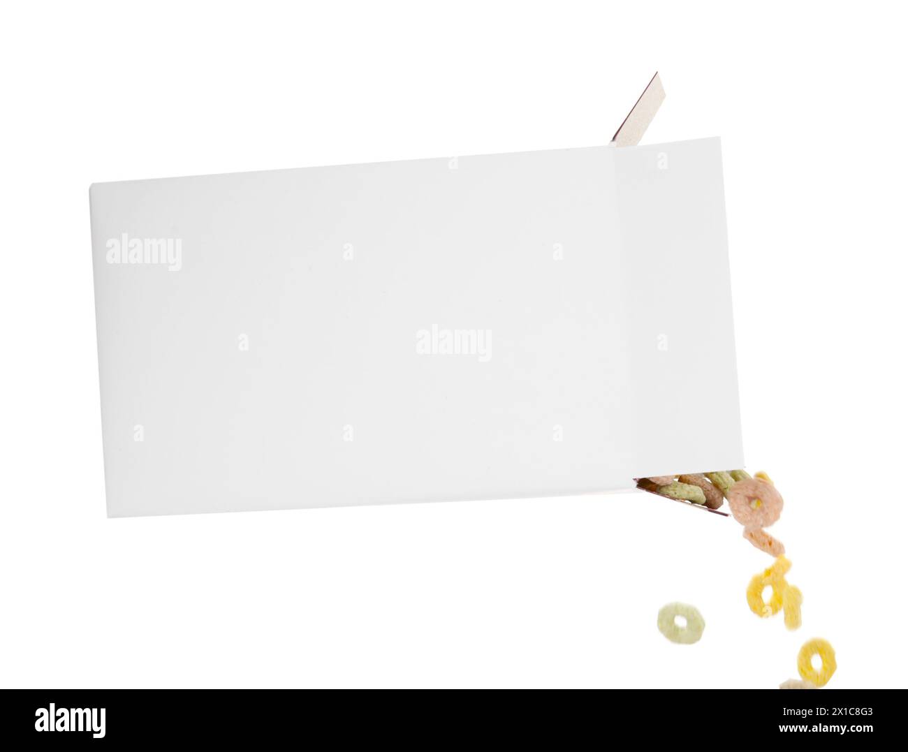 Pouring tasty cereal rings from paper box on white background Stock ...