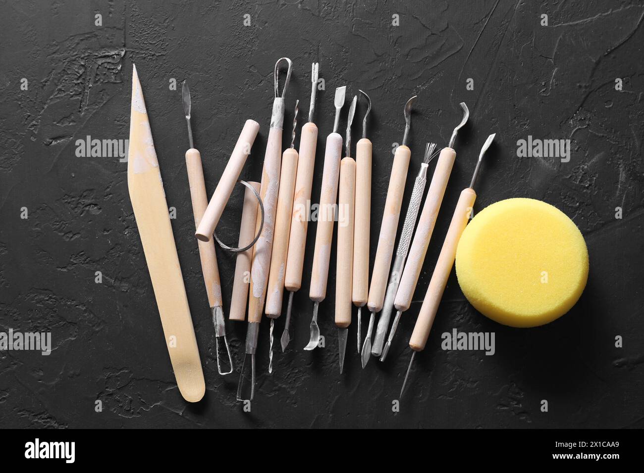 Set of different clay crafting tools and pottery sponge Stock Photo - Alamy