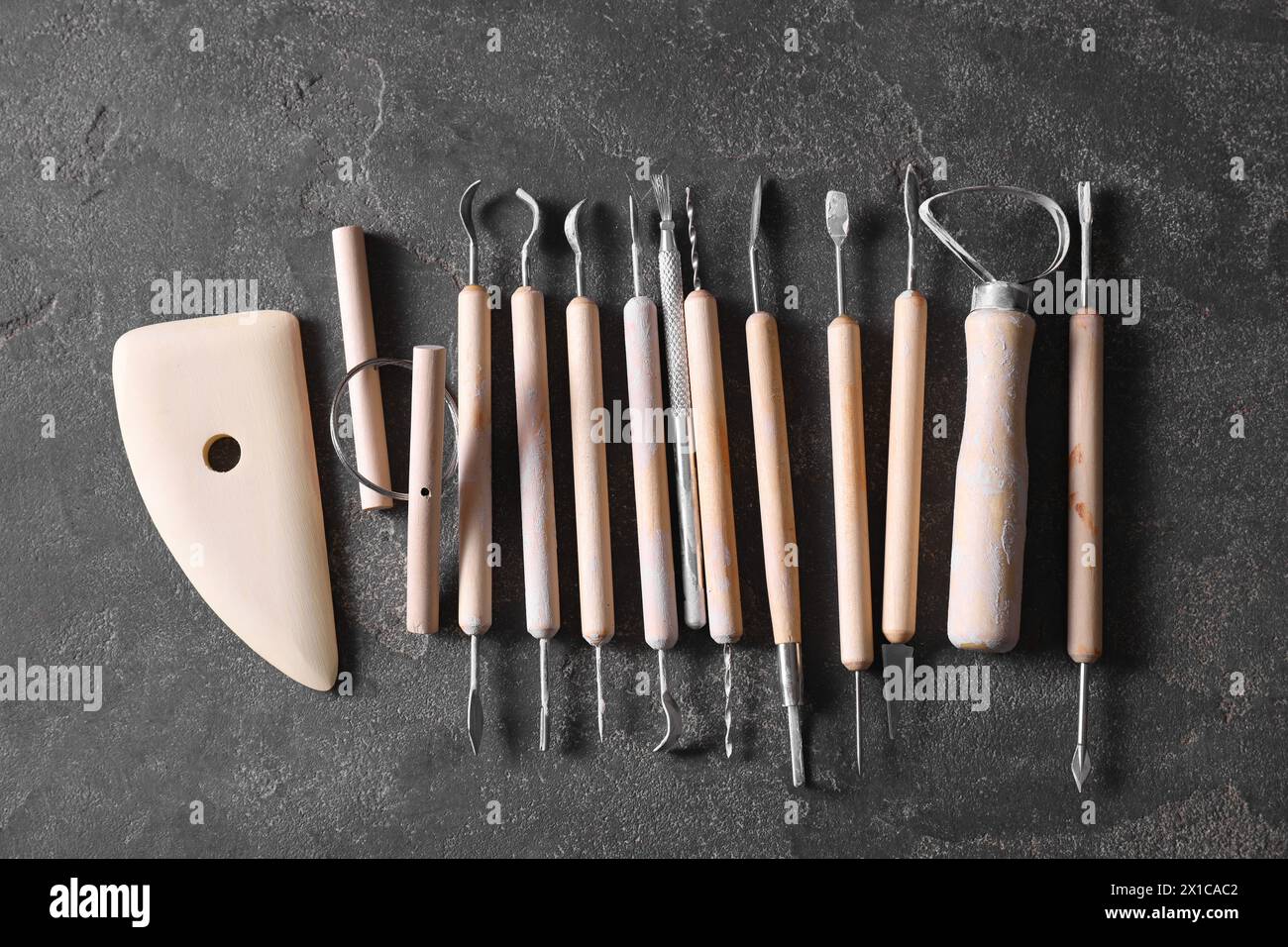 Set of different clay crafting tools on grey table, top view Stock ...