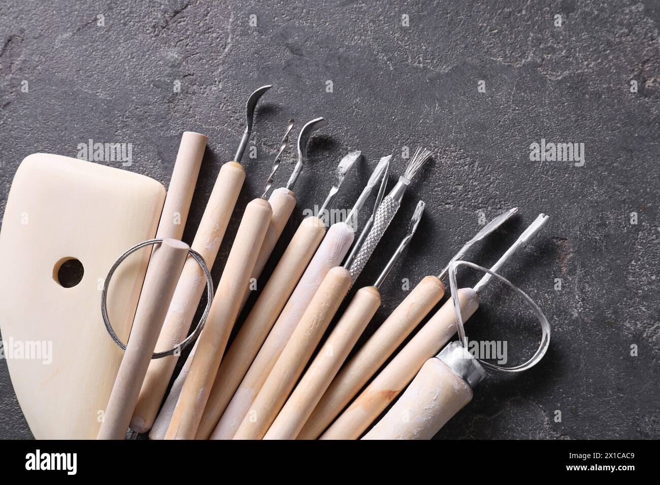 Set of different clay crafting tools on grey table, top view Stock ...