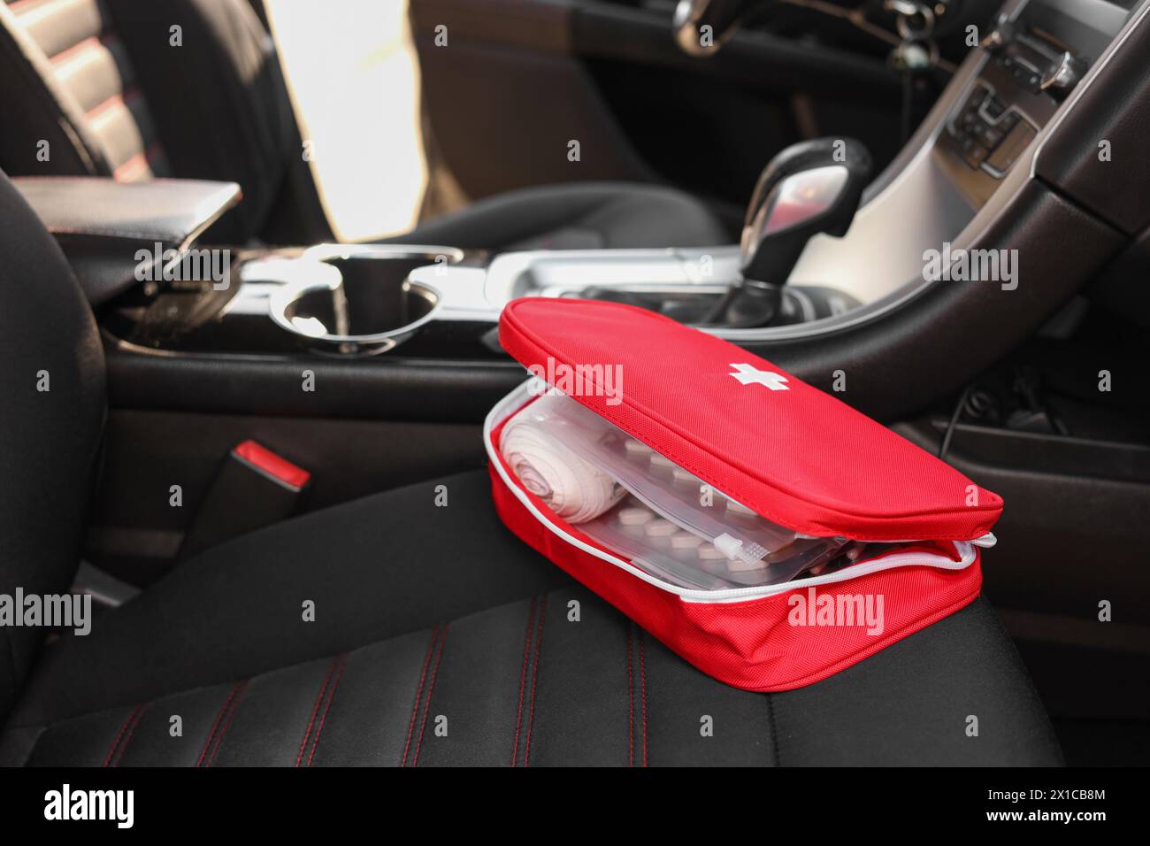 First aid kit with medicaments inside car Stock Photo - Alamy