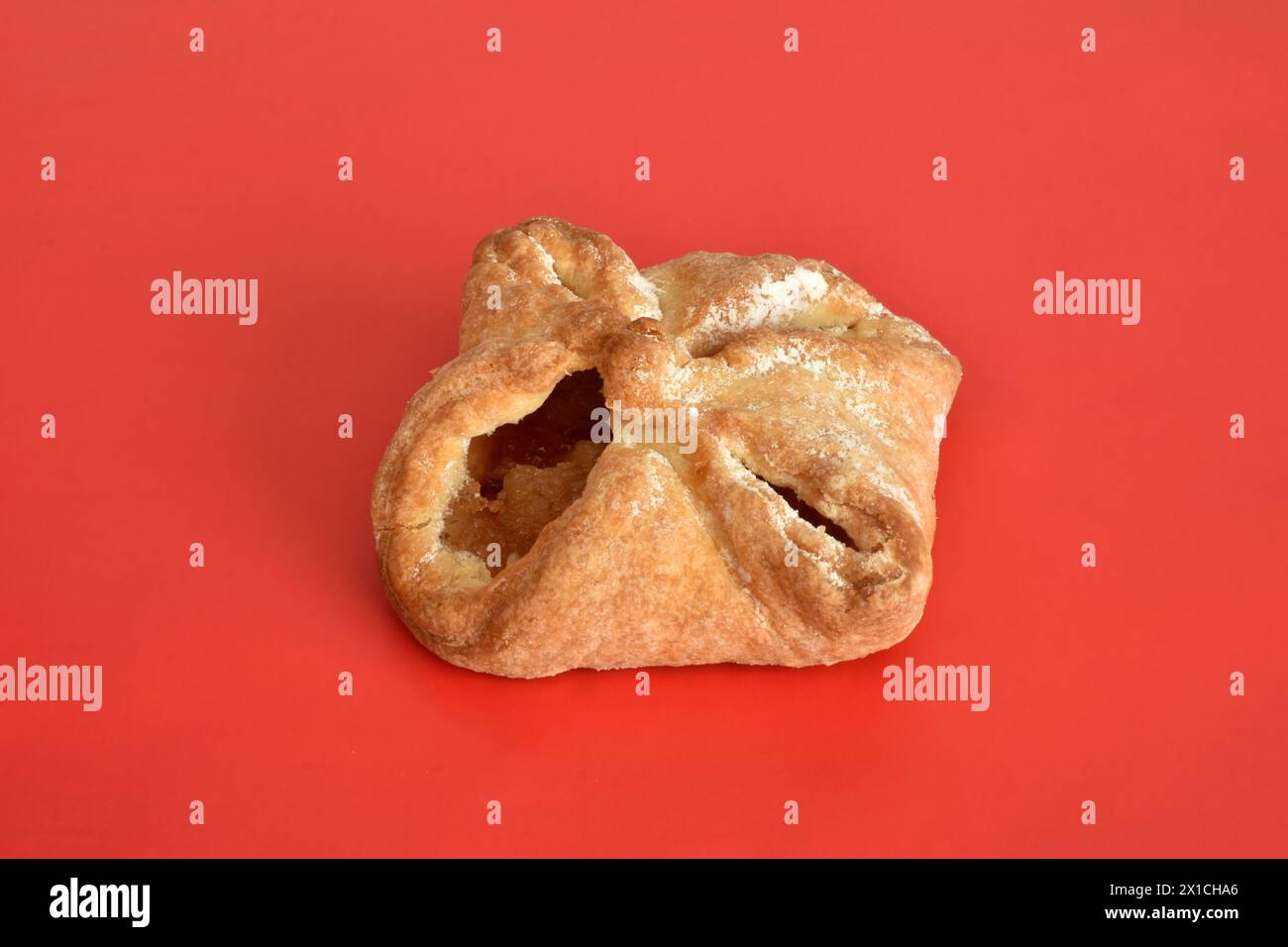 Cookies baked from puff pastry with filling inside Stock Photo - Alamy