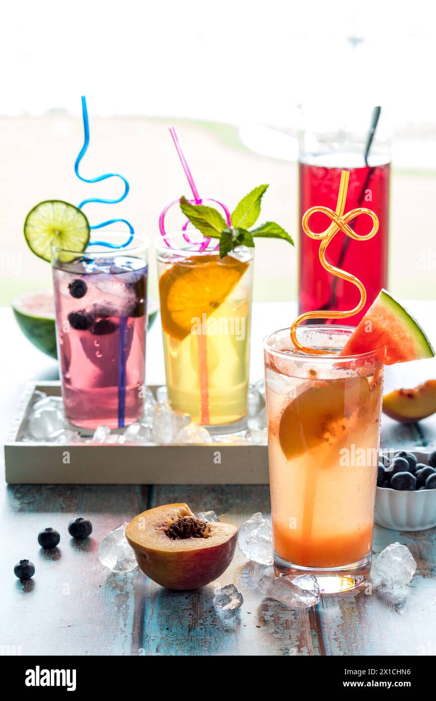 Refreshing fruit flavoured seltzer waters against a bright window Stock ...
