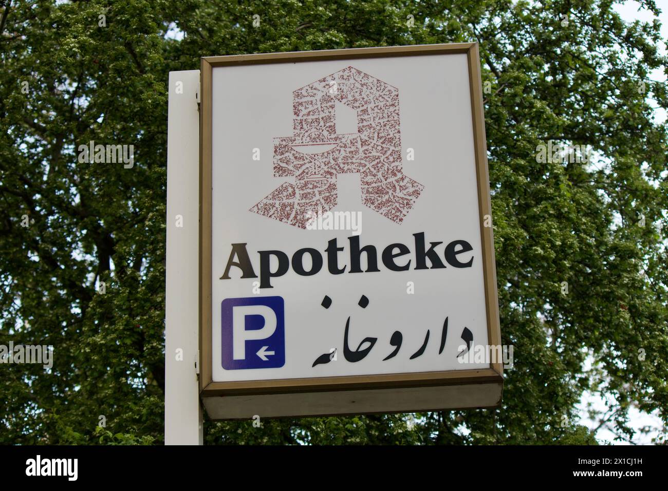Frankfurt am Main, Germany. April 10, 2024. Pharmacy sign in German and ...