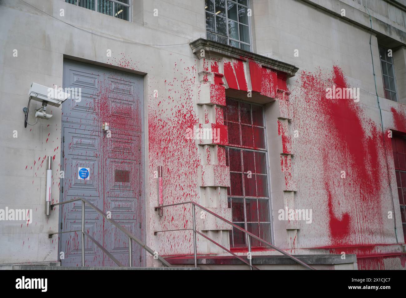 Red paint sprayed on the walls of the Ministry of Defence by Pro ...