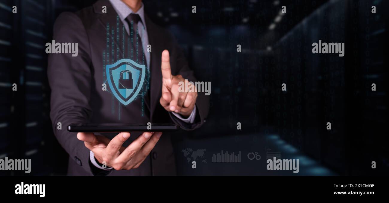 cybersecurity concept. man with tablet protects his digital information ...