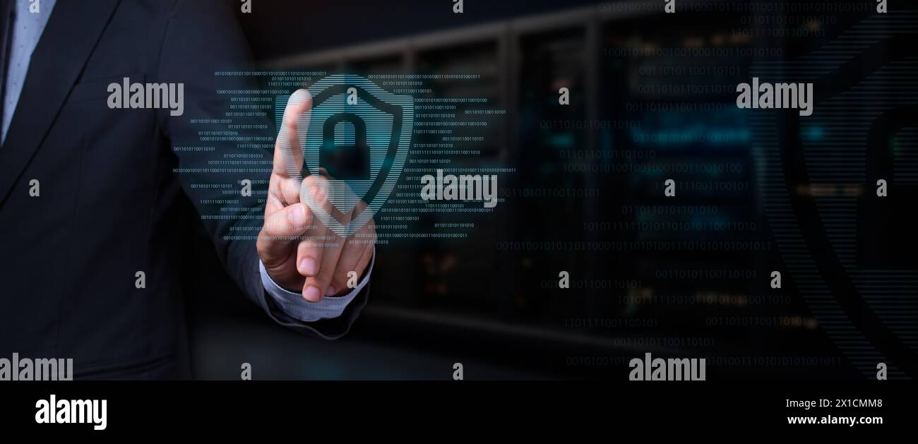 cybersecurity concept. businessman touches hologram of shield with ... cybersecurity concept. businessman touches hologram of shield with ...