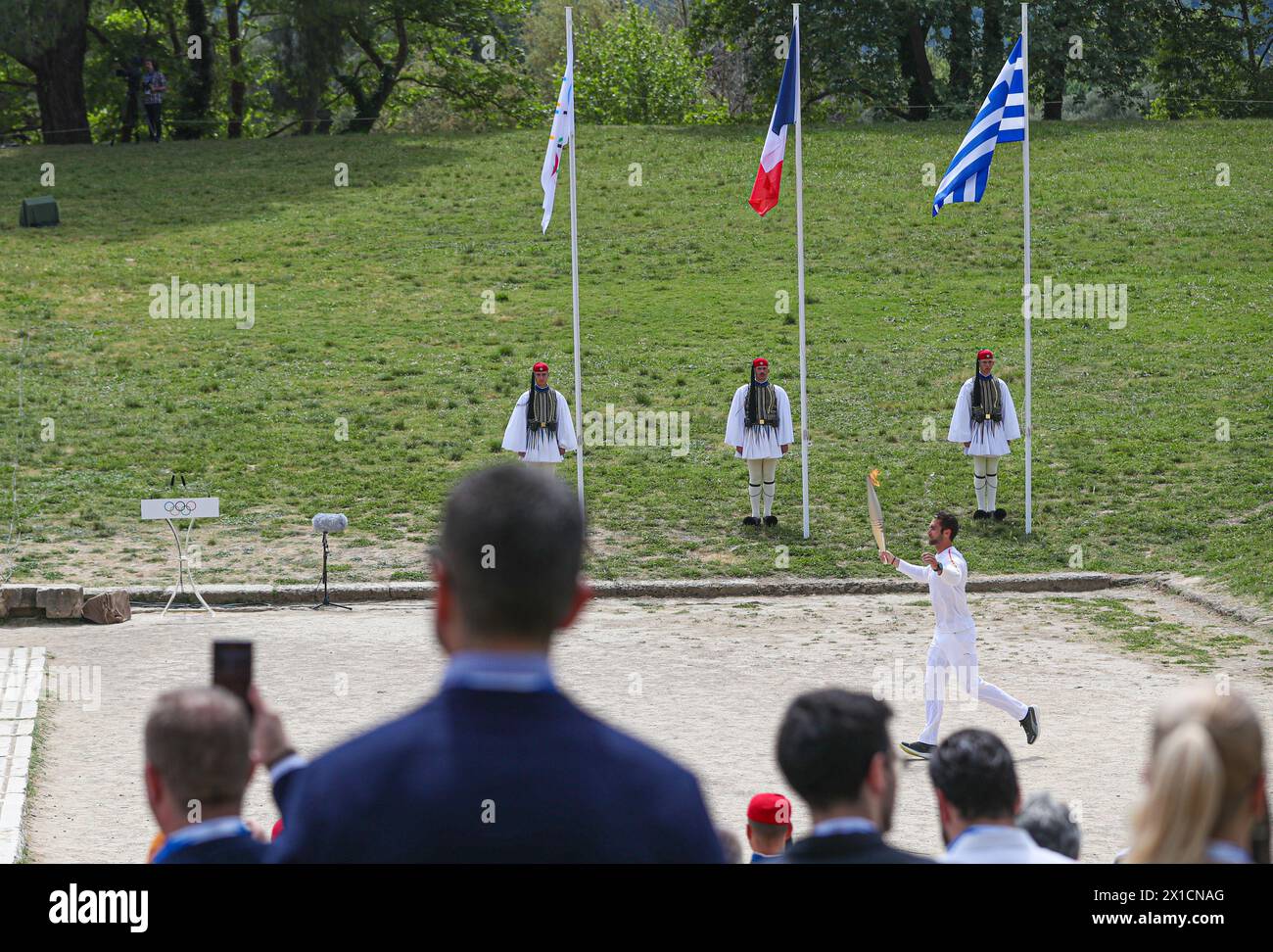 Ancient Olympia, Greece. 16th Apr, 2024. The first torch bearer, Greek ...