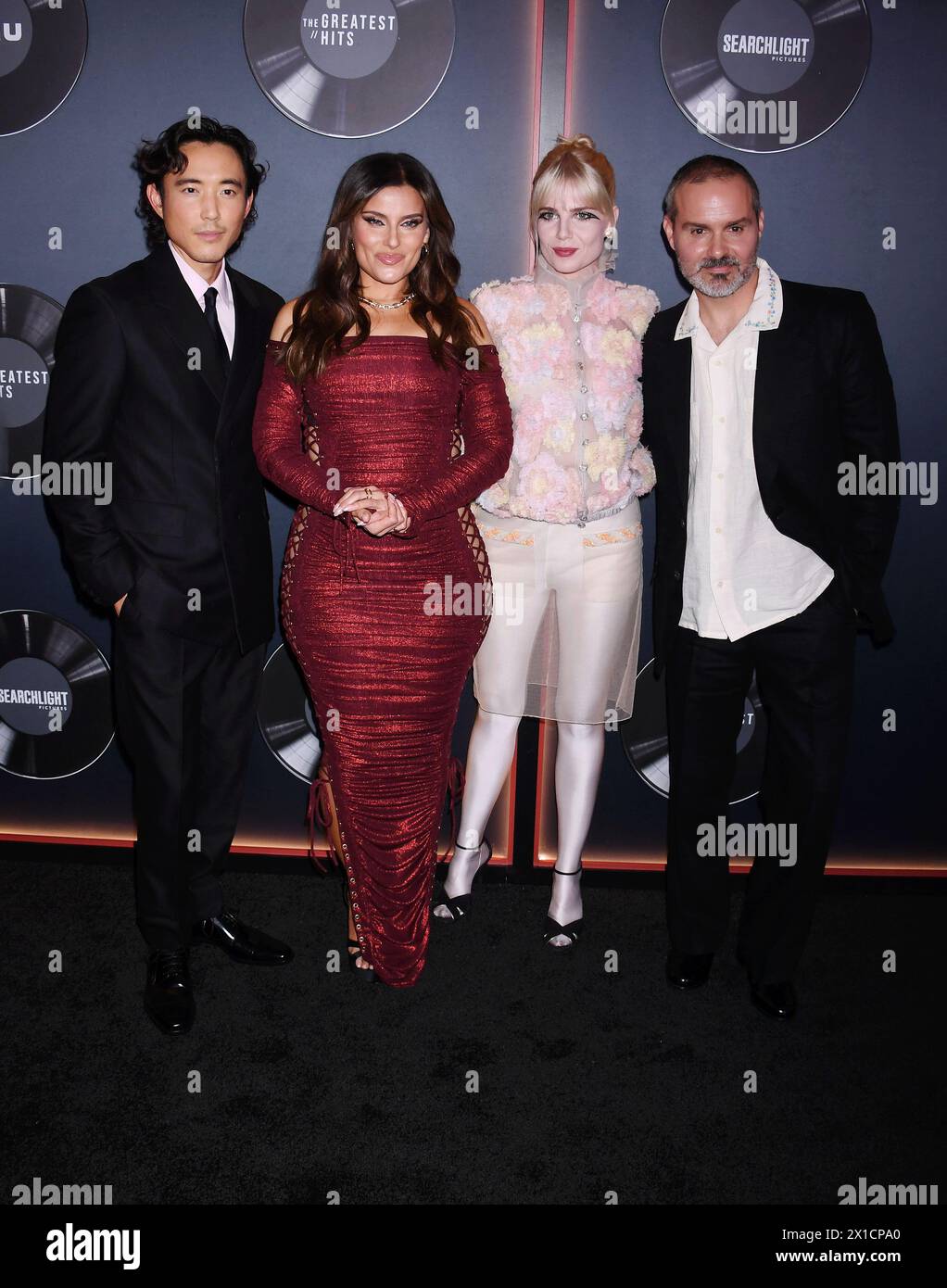 LOS ANGELES, CALIFORNIA - APRIL 15: (L-R) Justin H. Min, Nelly Furtado ...