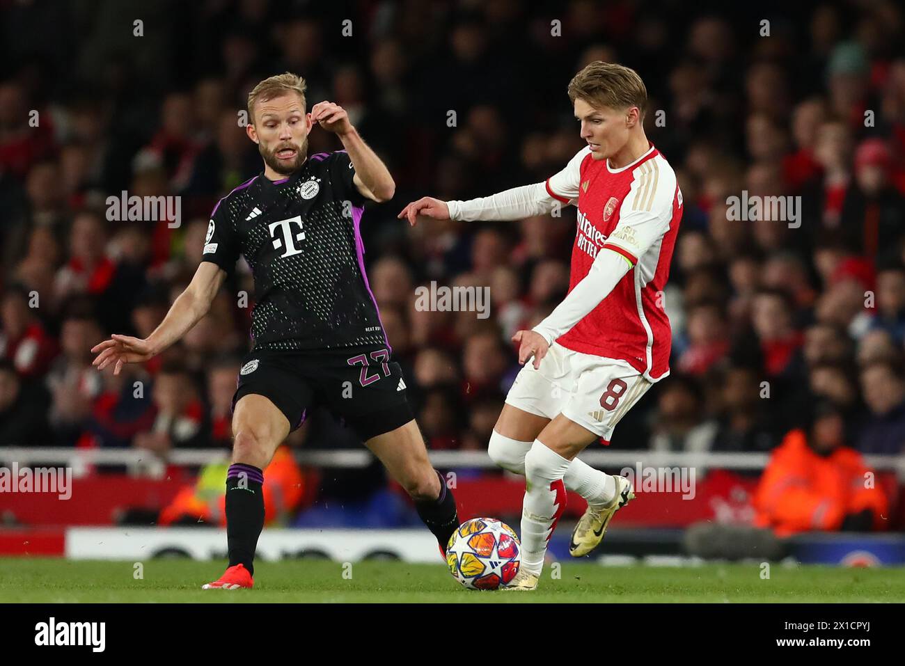 Martin Odegaard of Arsenal and Konrad Laimer of Bayern Munich - Arsenal ...