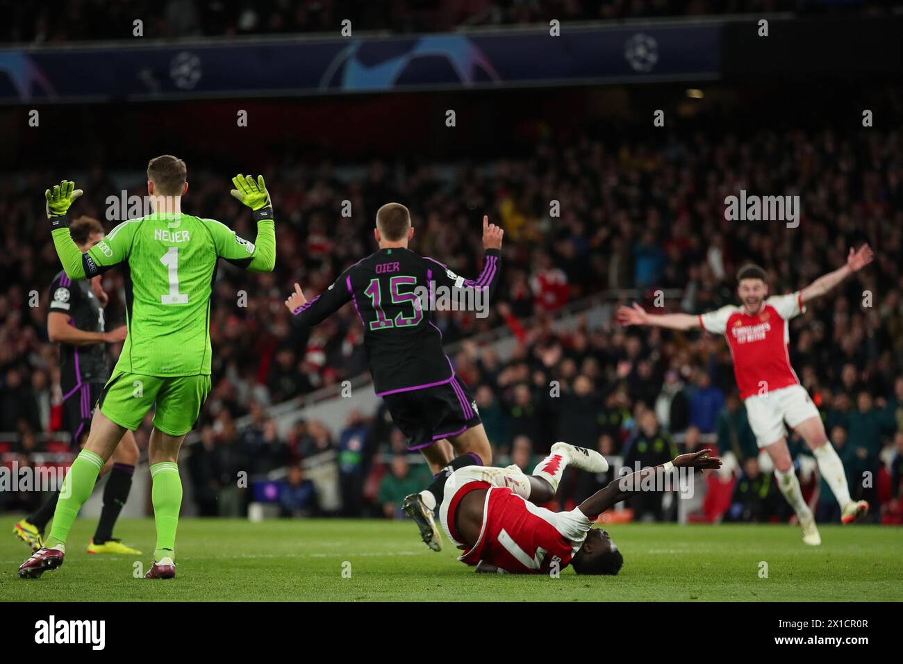 Bukayo Saka of Arsenal goes down in the penalty area after a challenge ...