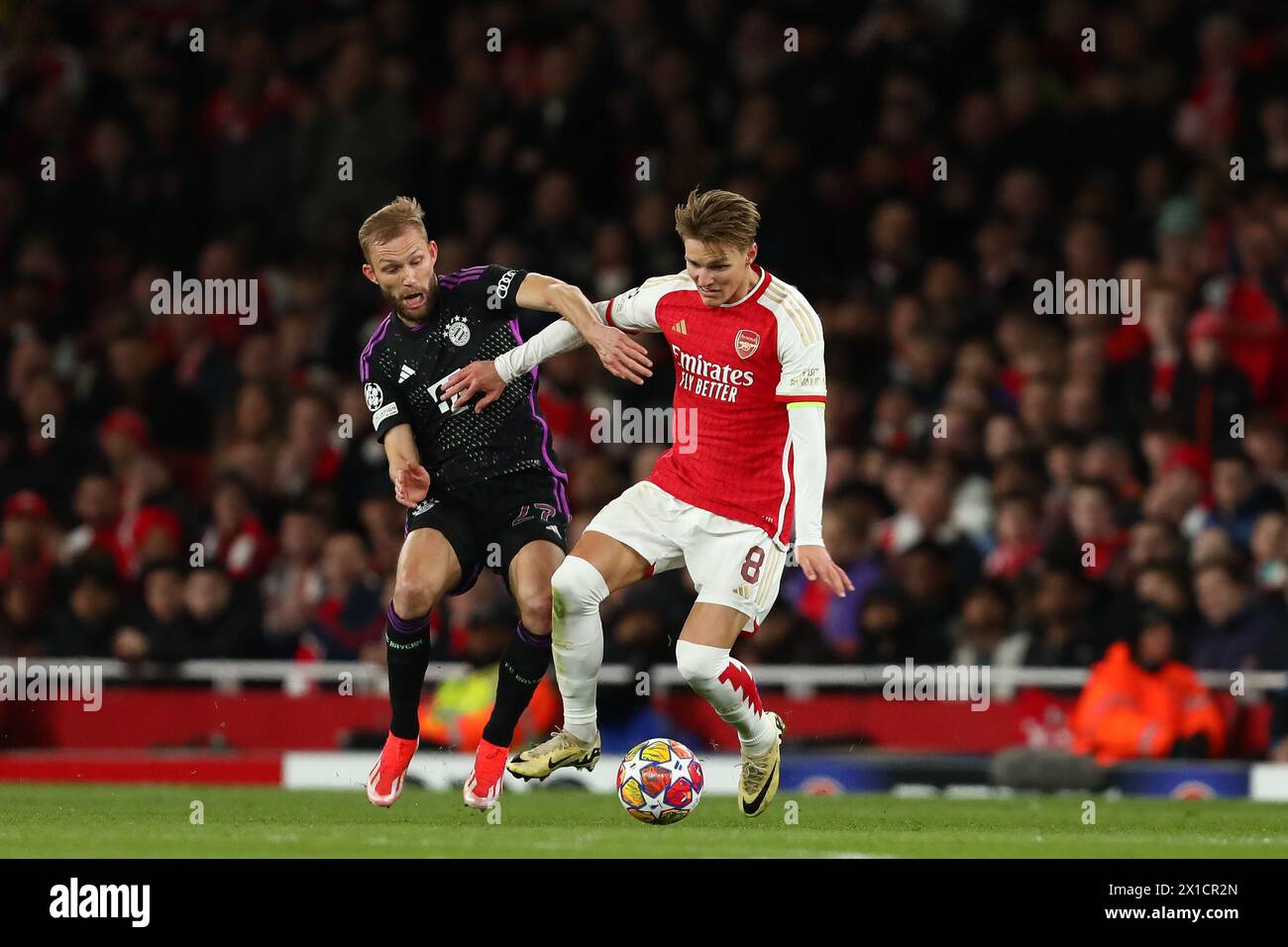 Martin Odegaard of Arsenal and Konrad Laimer of Bayern Munich - Arsenal ...