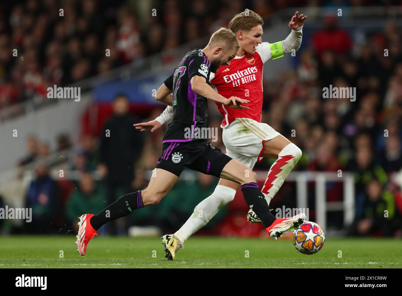Martin Odegaard of Arsenal and Konrad Laimer of Bayern Munich - Arsenal ...