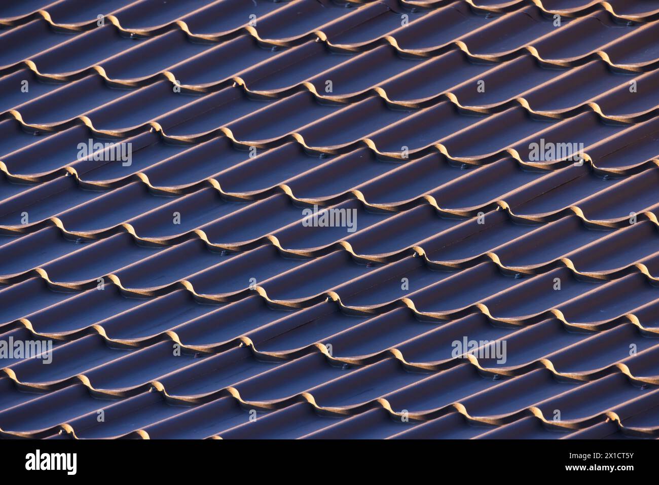 Metal roof tiling with wavy shape pattern, close up photo of modern ...